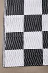Checkerboard Indoor/Outdoor Woven Rug | Urban Outfitters